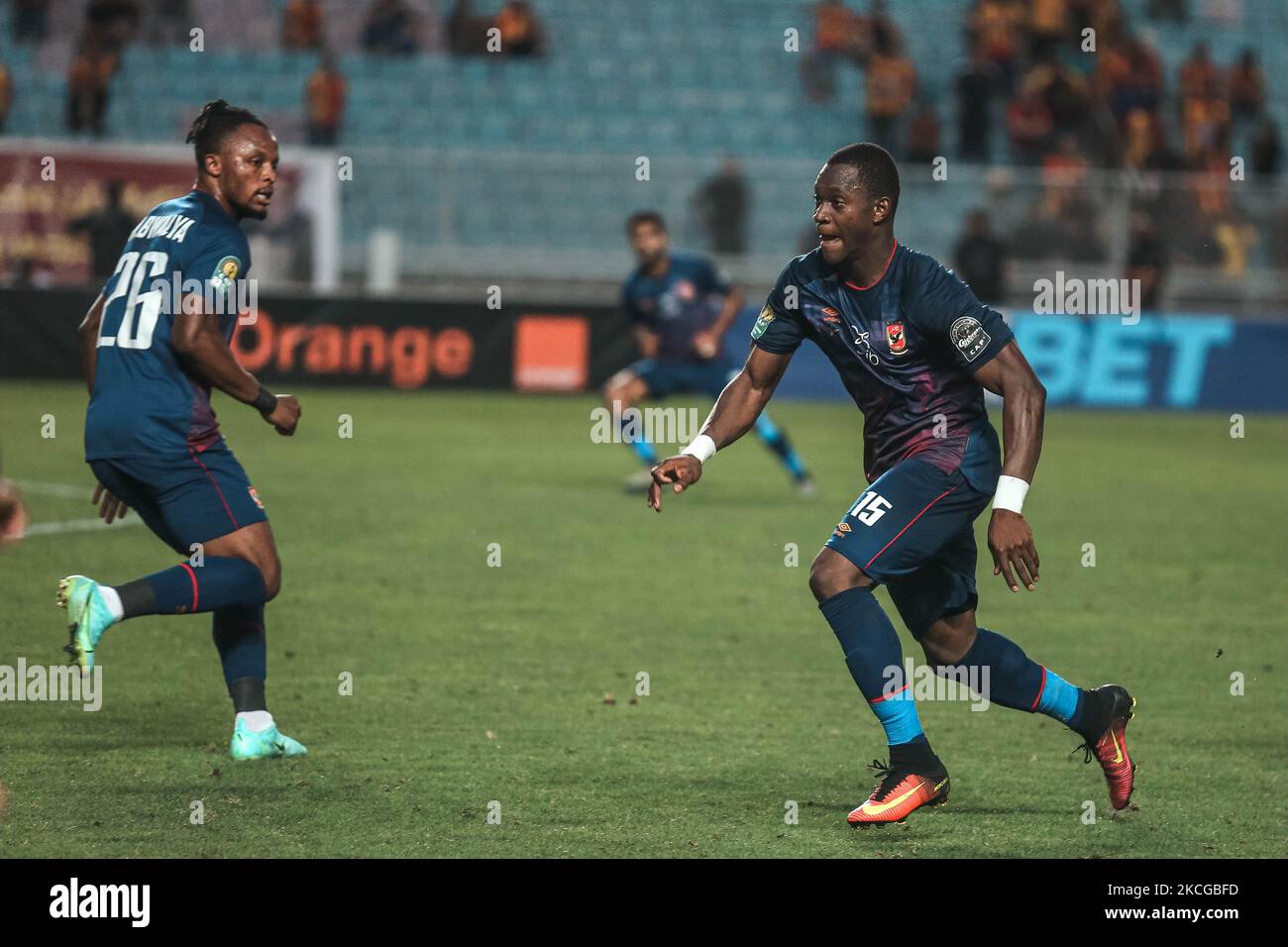 Defensive Midfielder for Al Ahly, Aliou Dieng (# 15) and Walter Bwalya ...