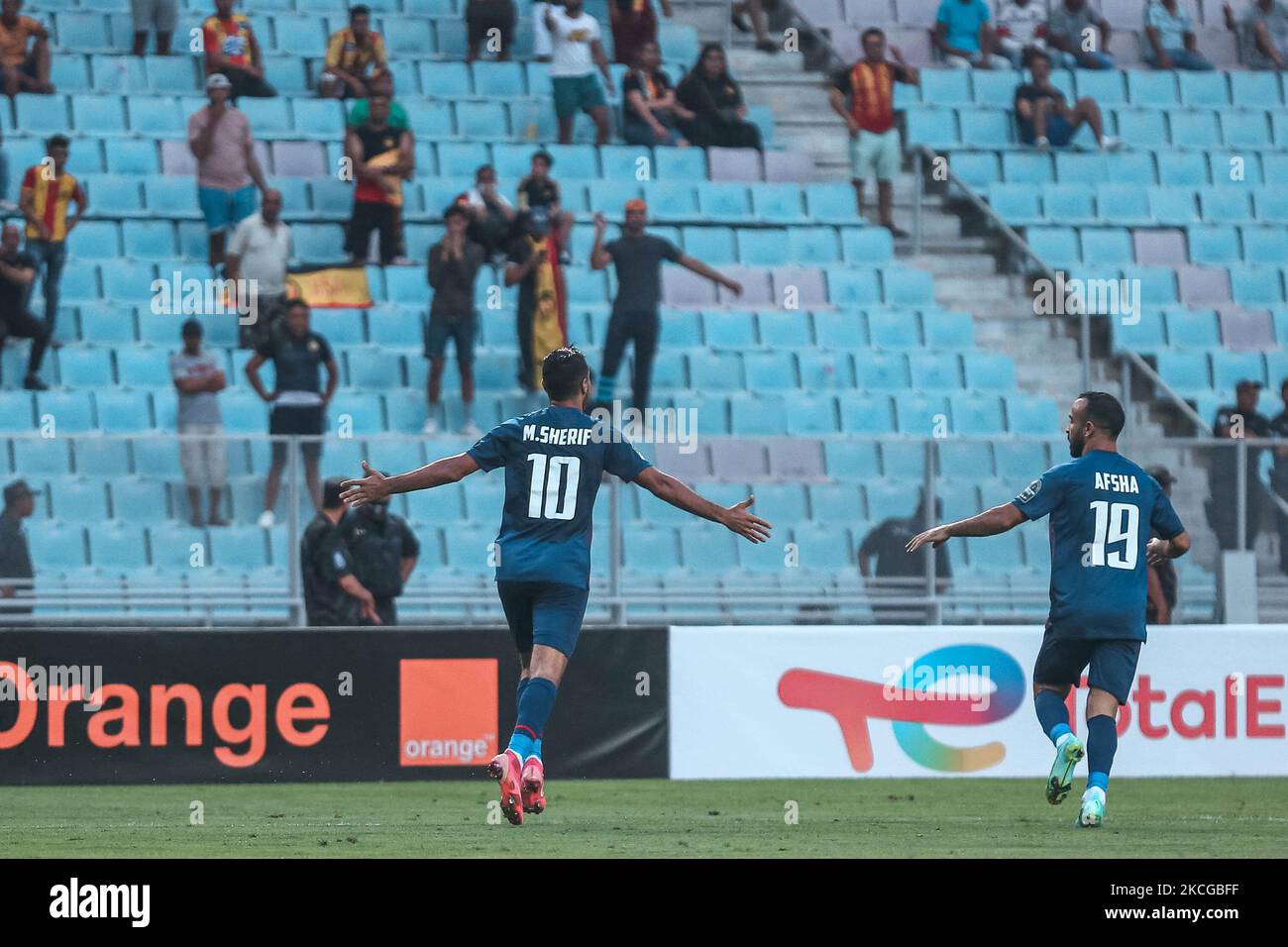 Ahly's midfielder Mohamed Magdy ''Afsha'' (R) celebrates with his ...