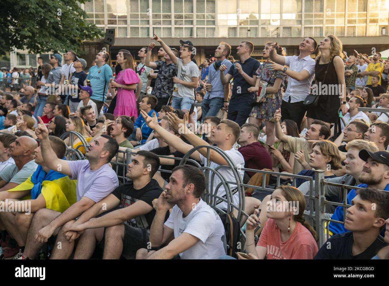 Ukrainian soccer fans cheer at the Fan Zone in downtown Kyiv, Ukraine ...