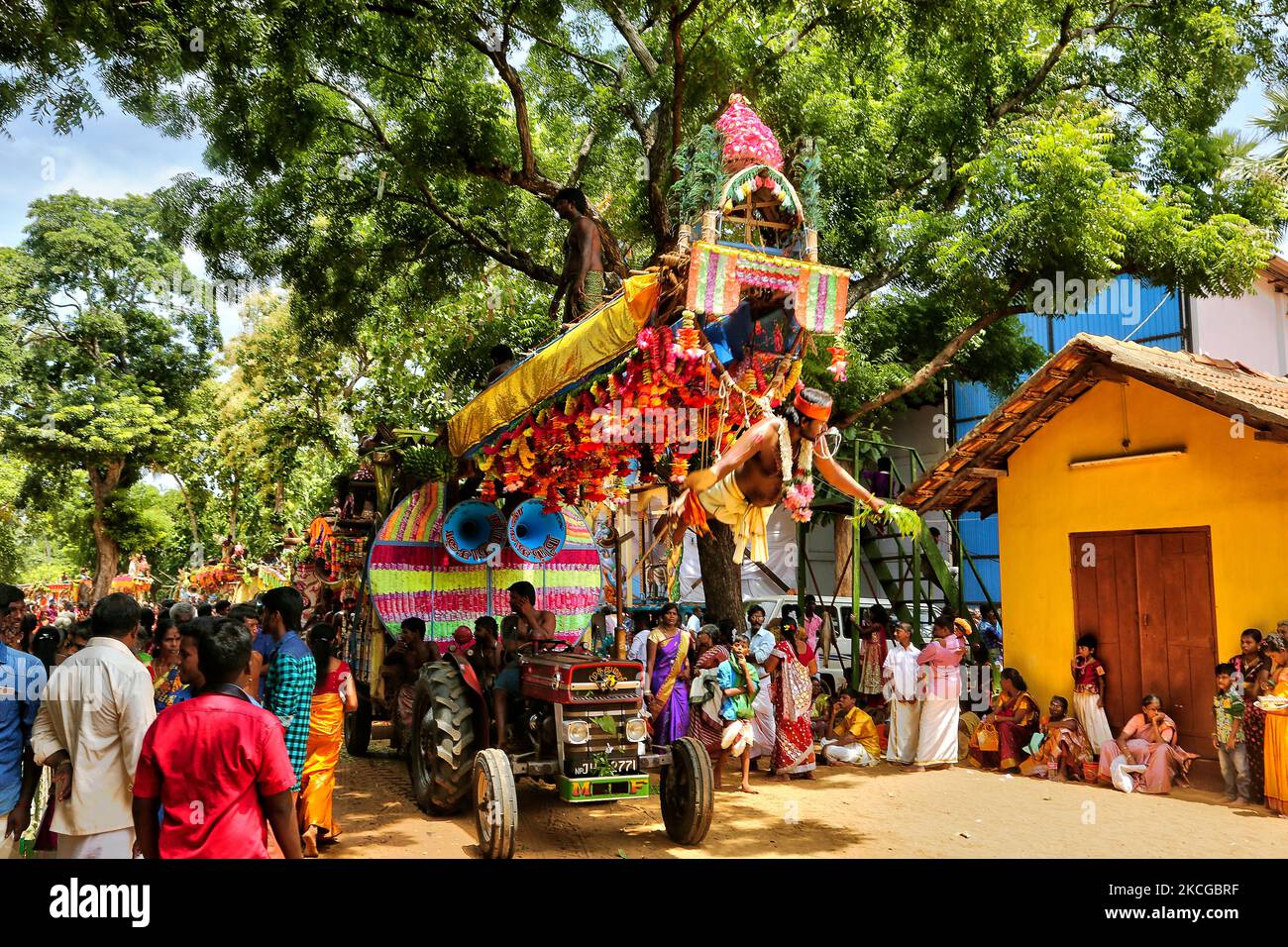Tamil Hindu devotee performs the para-kavadi ritual (where he is ...
