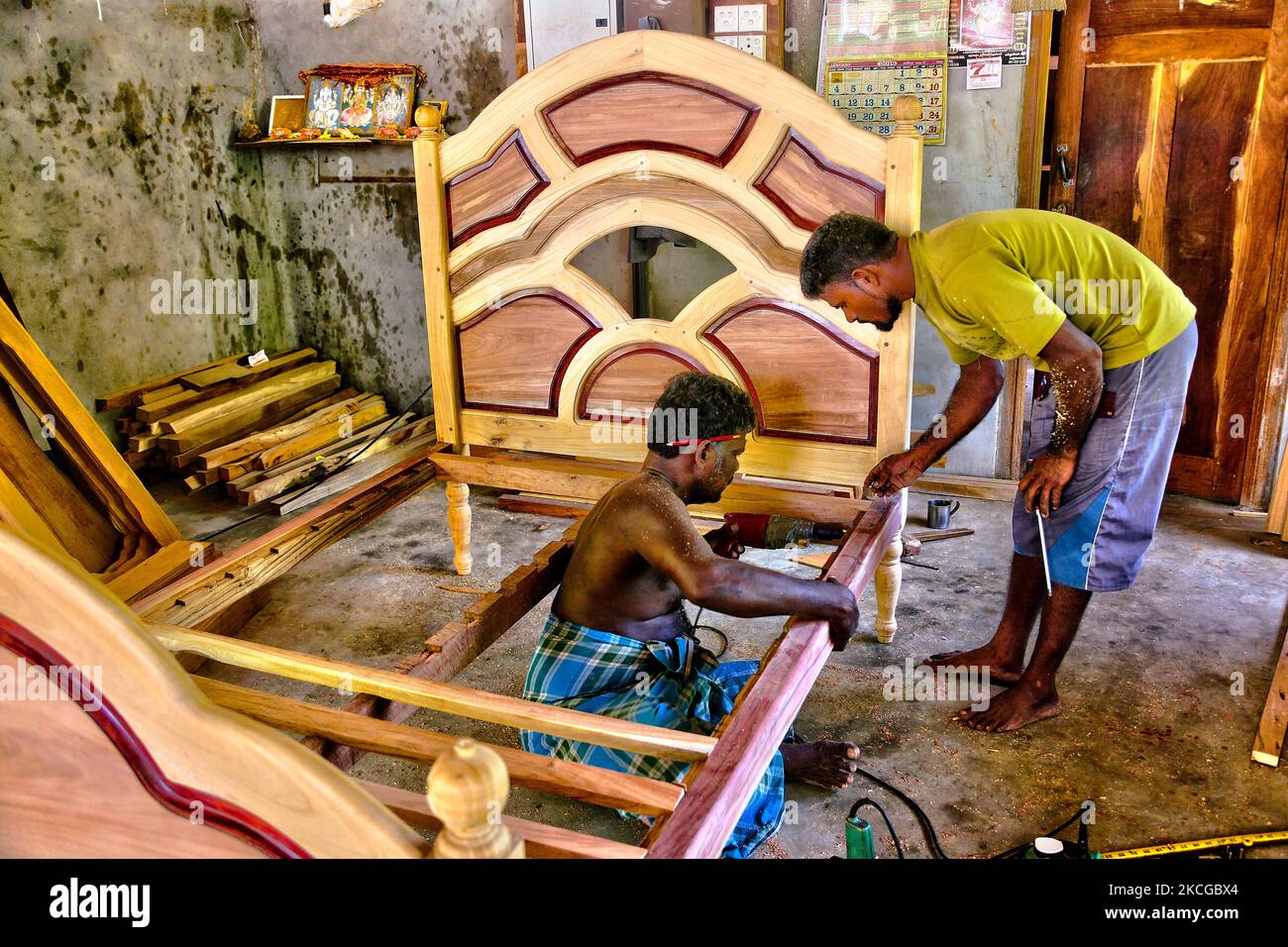 Asian carpenter making wooden bed hi-res stock photography and images ...