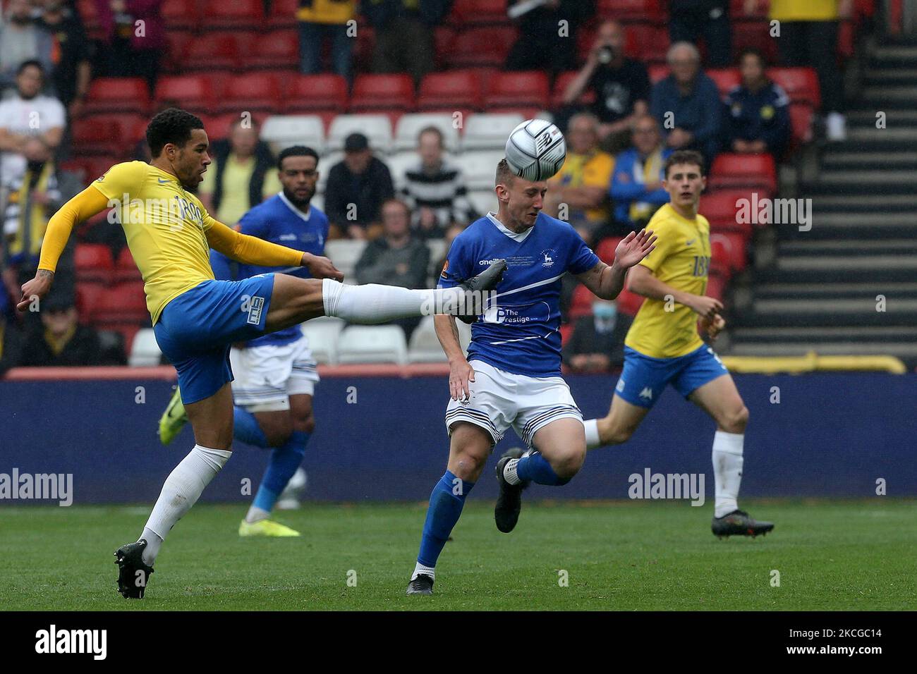 Ben Wynter of Torquay United in action with Hartlepool United's David ...