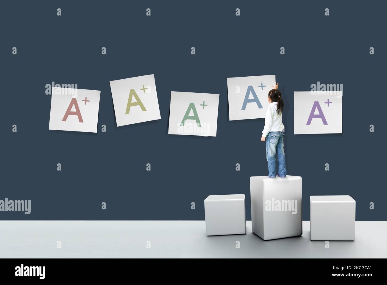 Young student standing in front of school blackboard dreaming of ...
