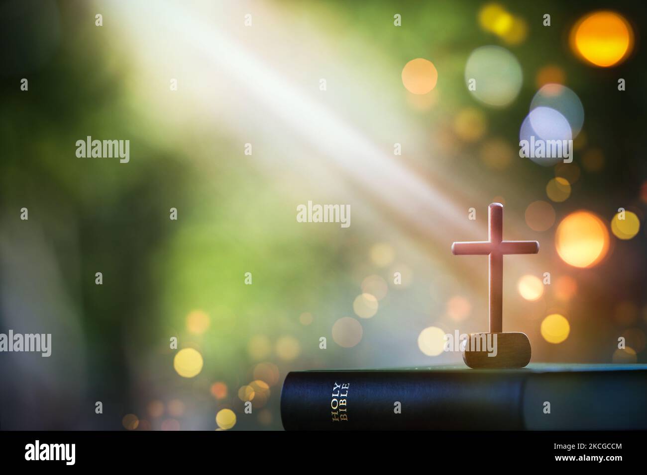 Christmas bright light background with bible and crucifixion of Jesus ...