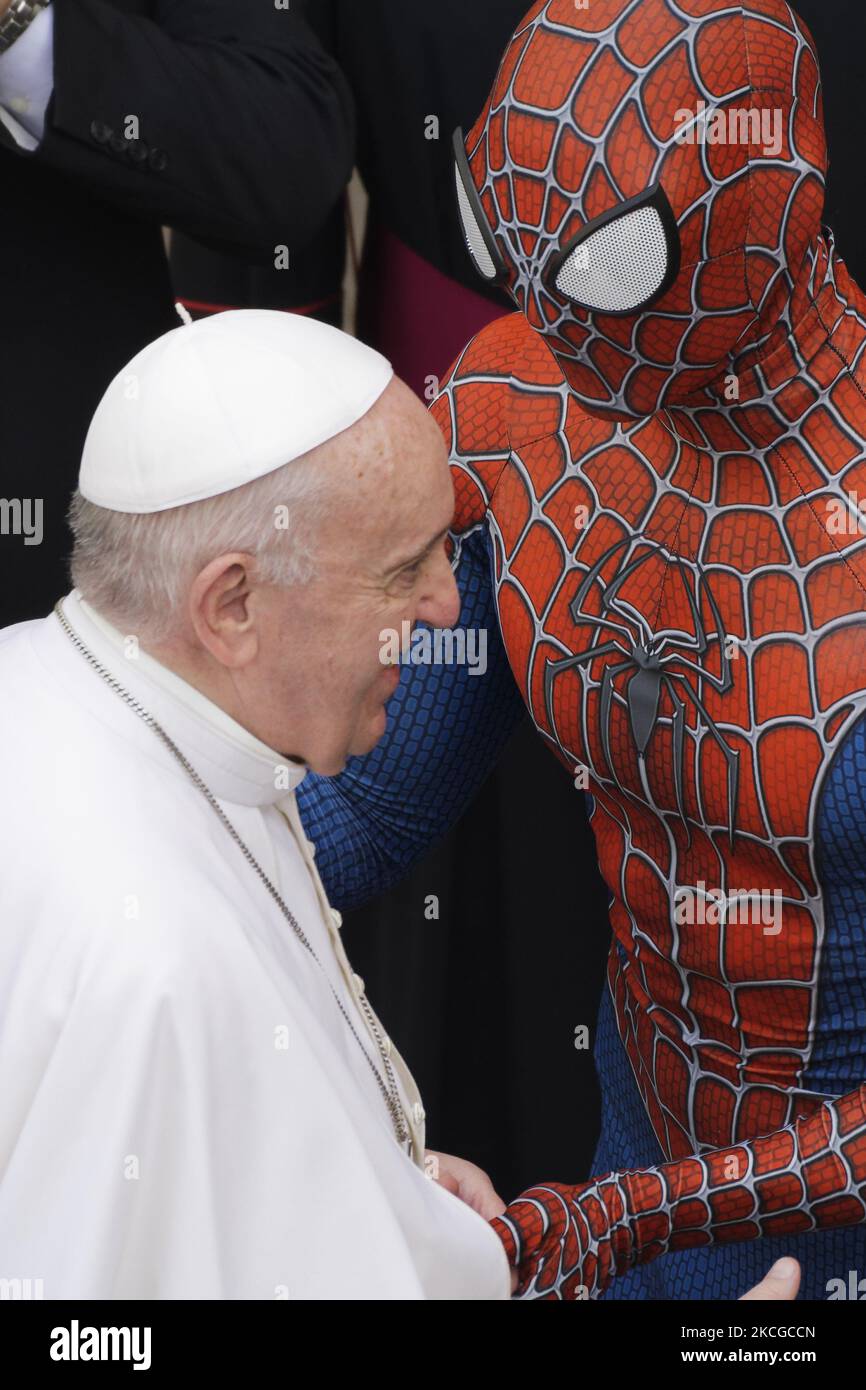 Pope Francis meets Spider-Man, who presents him with his mask, at the ...