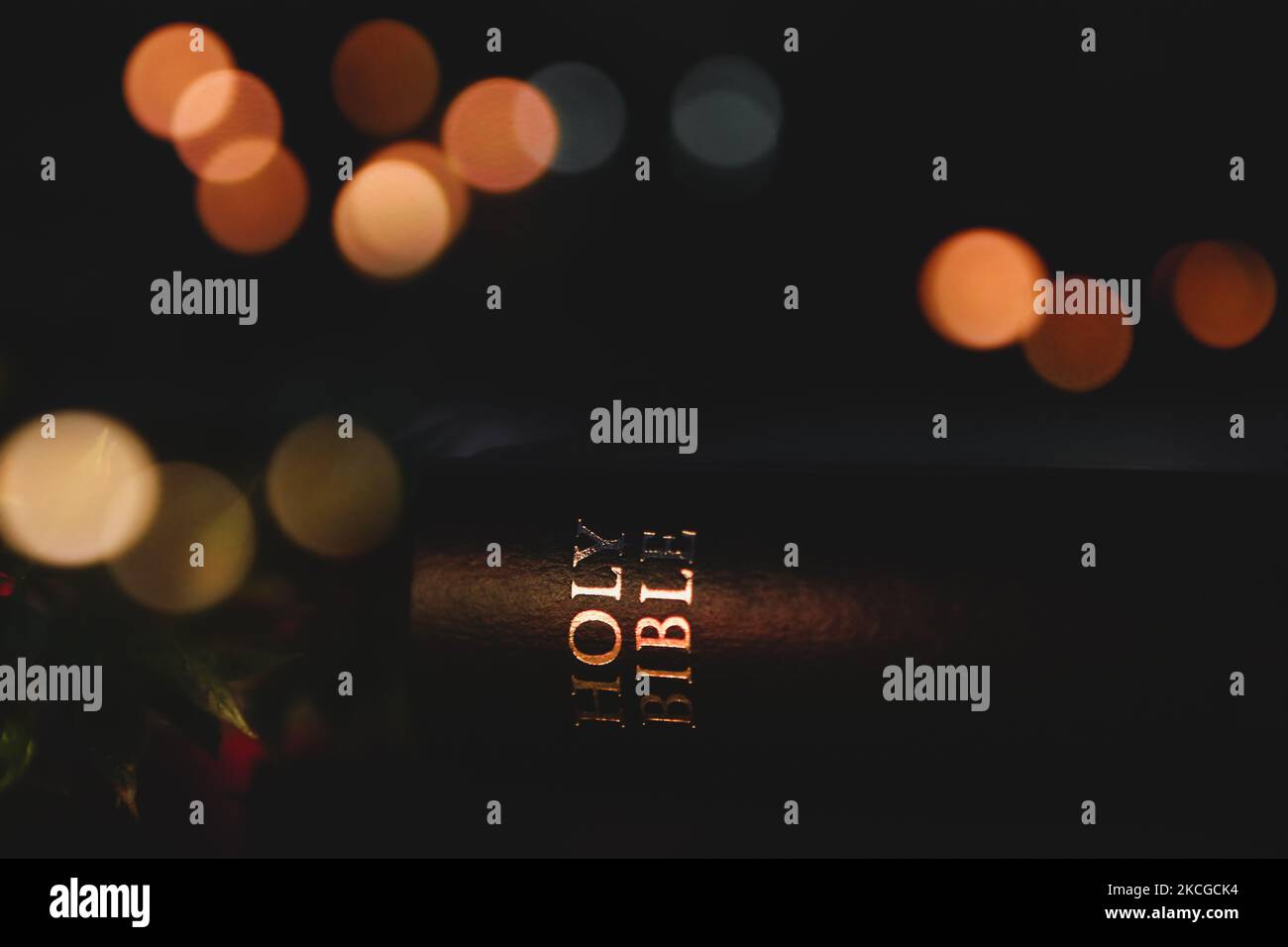 Christmas bright light background with bible and crucifixion of Jesus ...