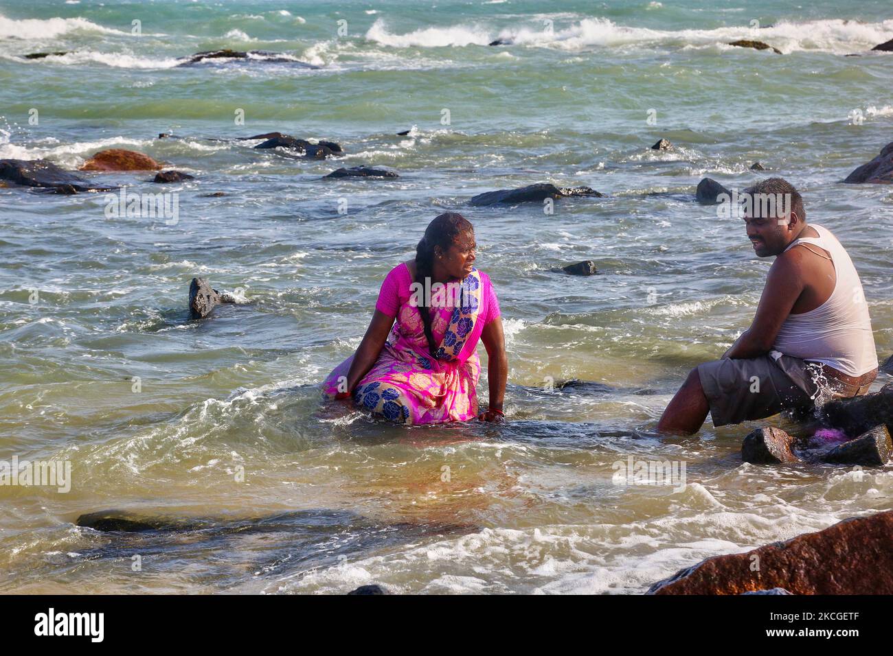 People relax in the ocean in Kanyakumari, Tamil Nadu, India ...
