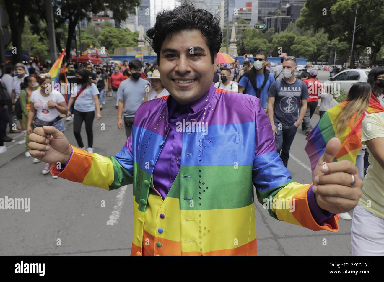 A member of the LGBTTTIQA community dressed as Mexican singer Juan ...