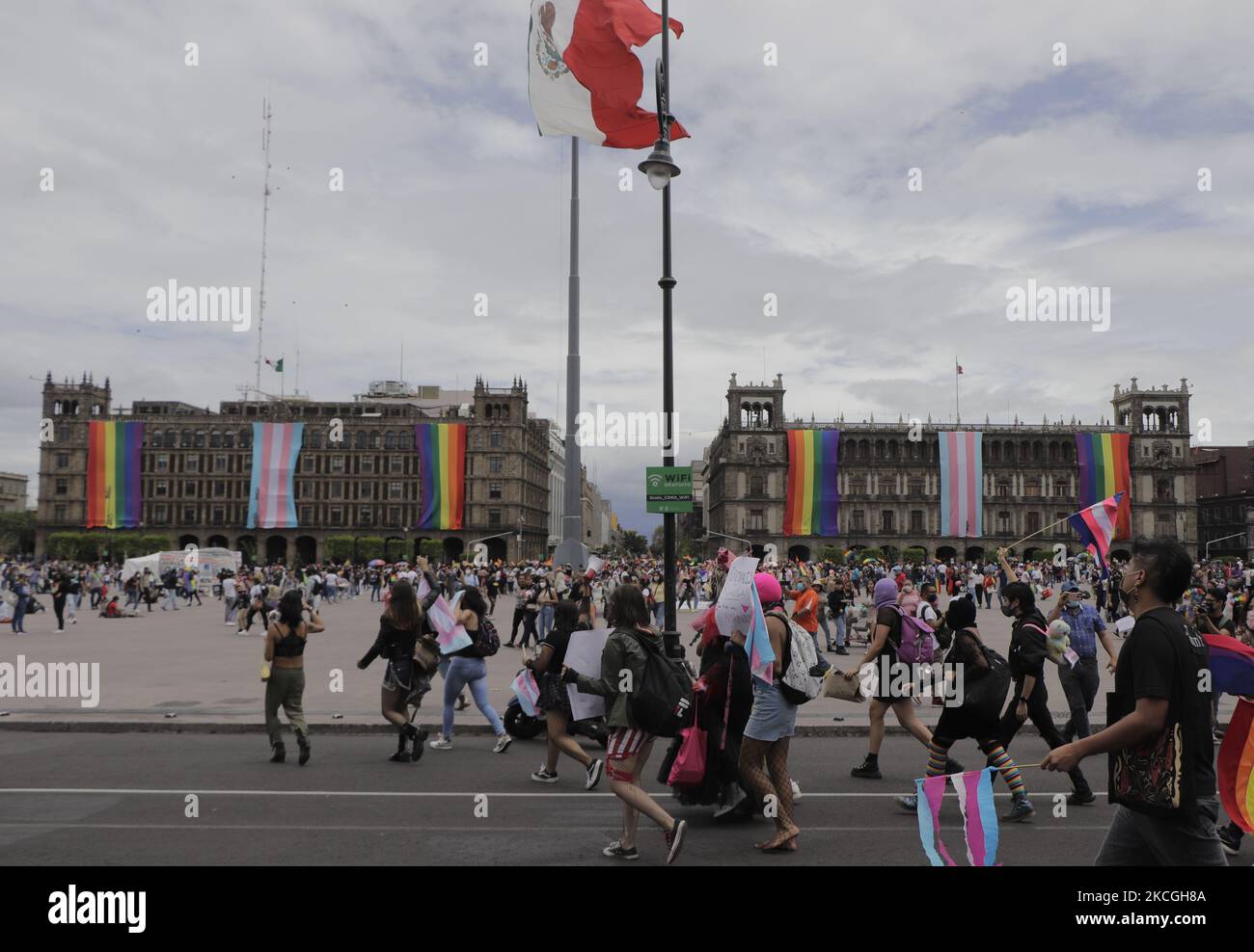 Members of the LGBTTTIQA community arrive at Mexico City's Zócalo for ...