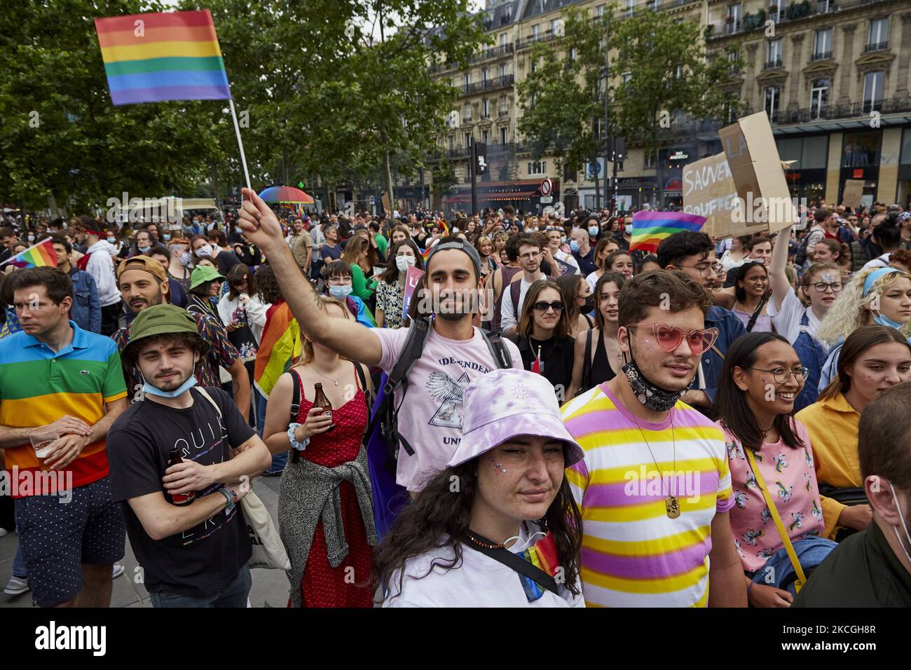 Participants take part at the annual Pride March parade in Paris on ...