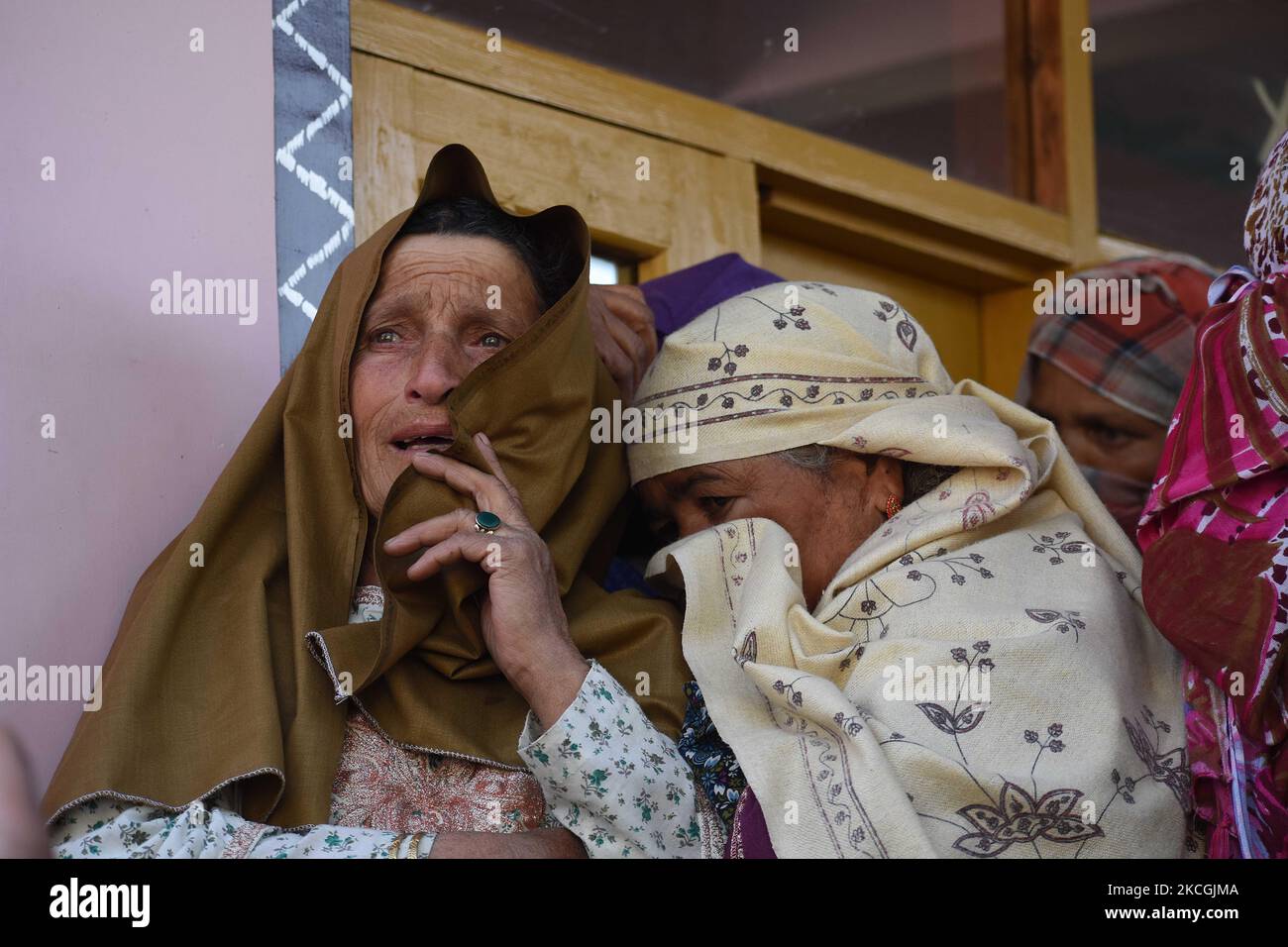 women mourn the death of 25 year old Rafia Jan during the funeral ...