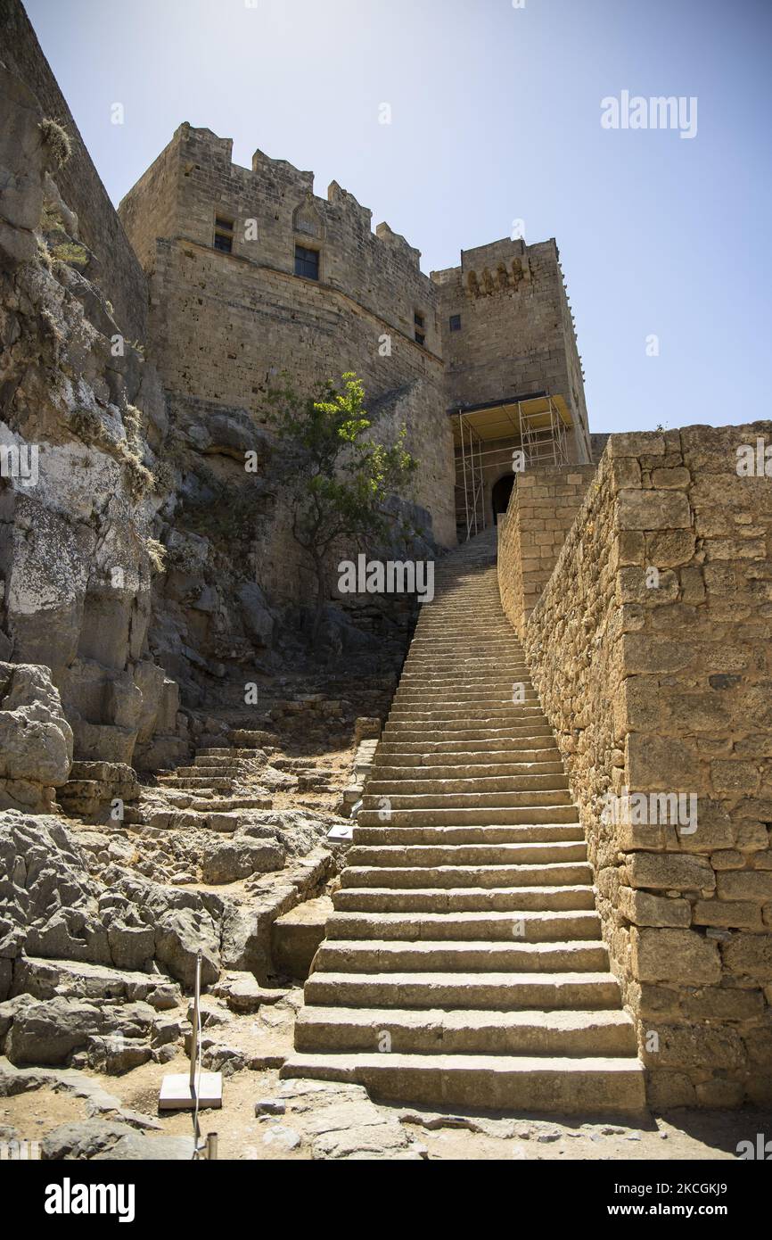 View on the fortifications at the entrance of the acropolis of Lindos ...