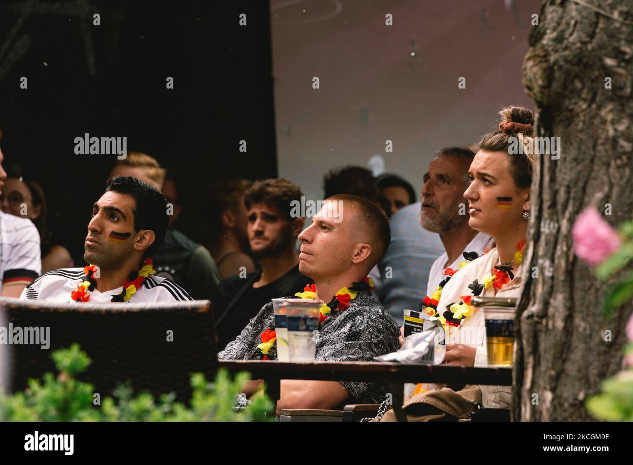 German football fans watch the match during Euro 2020 match between ...