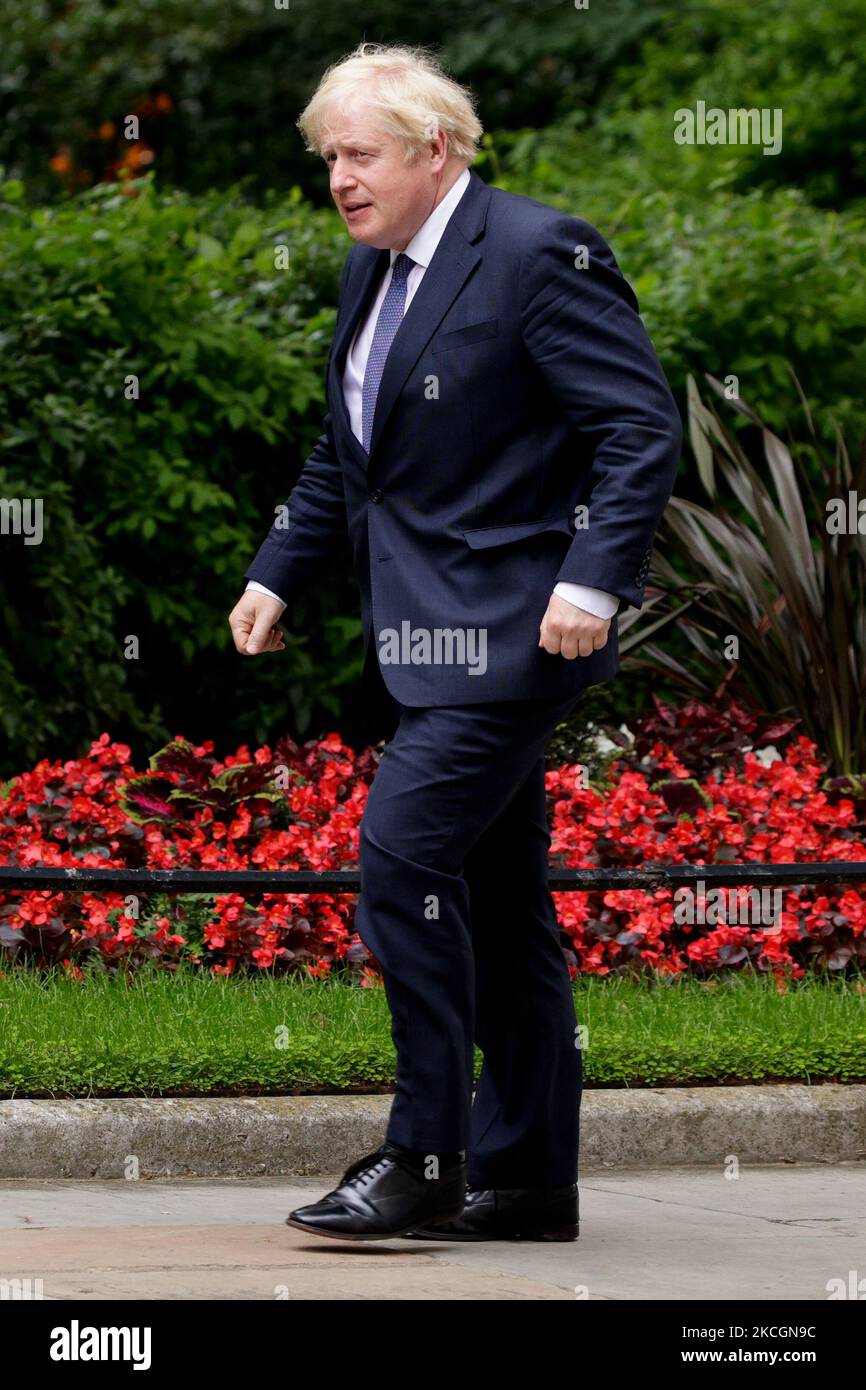 British Prime Minister Boris Johnson returns to Downing Street from his ...
