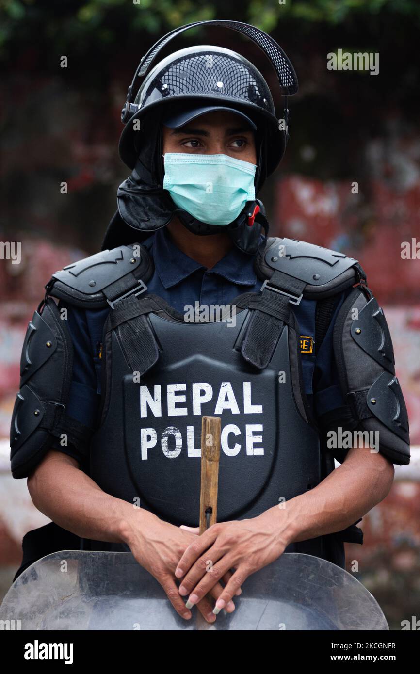 Nepalese Police stand guard during an anti-government protest in ...