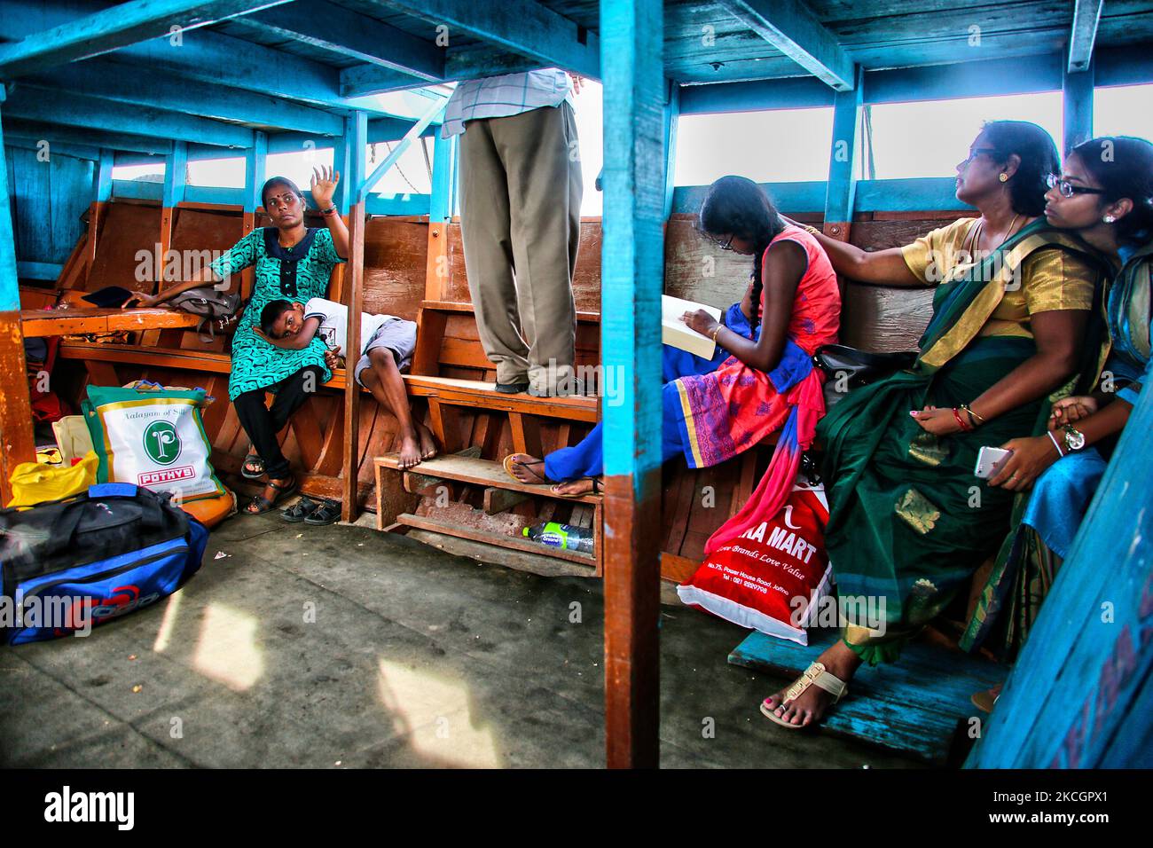 Passengers inside a ferry boat heading from Analaitivu Island to Kanaki Harbour in Jaffna, Sri ...