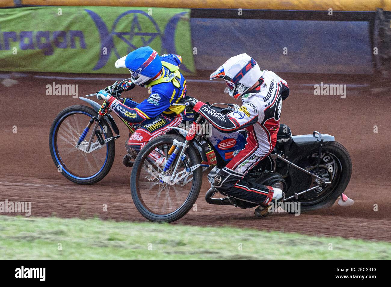 Anders Rowe (Blue) passes Steve Worrall (White) during the SGB ...