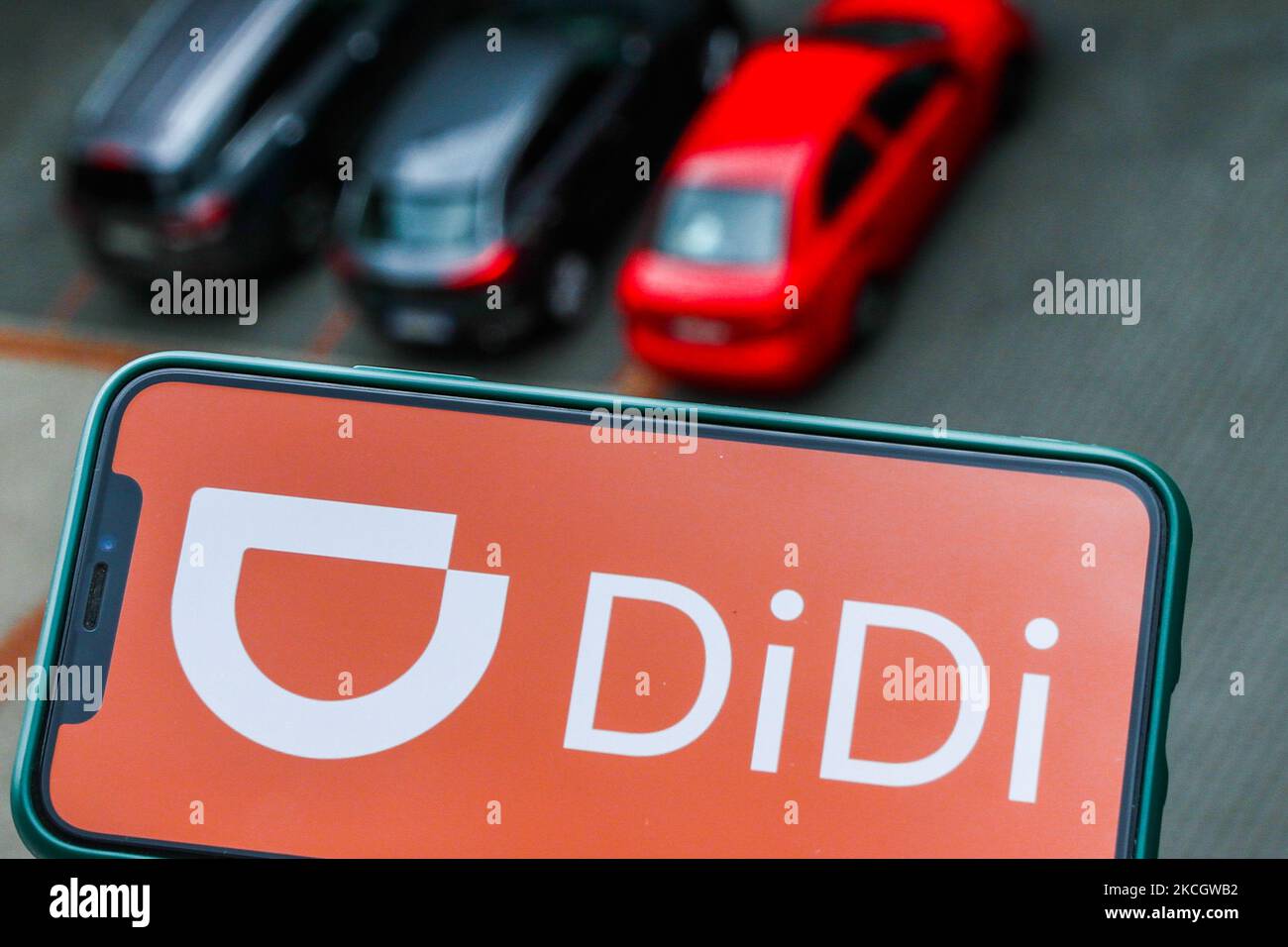 DiDi logo is seen displayed on a phone screen in this illustration ...