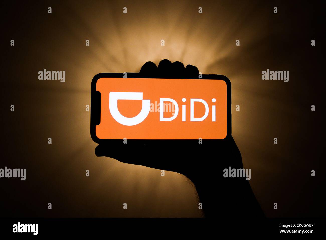 DiDi logo is seen displayed on a phone screen in this illustration ...