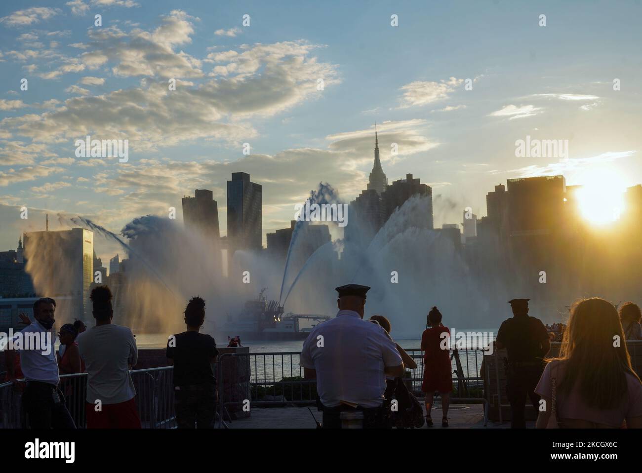 Boats spray water in the colors of the flag in the East River at the ...