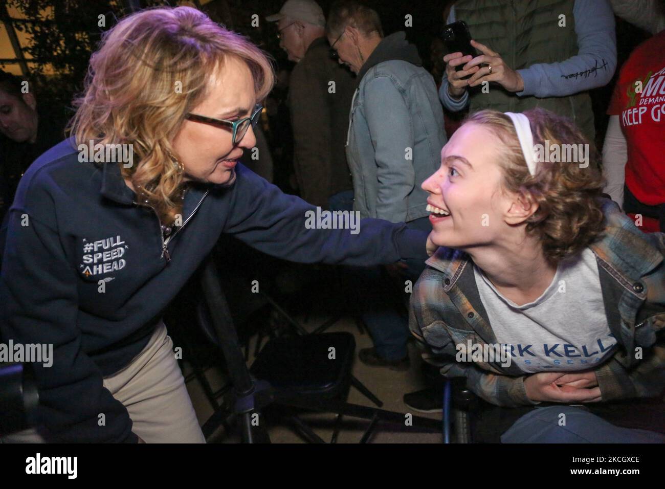 Congresswoman Gabby Giffords greets a woman in the audience after a get ...