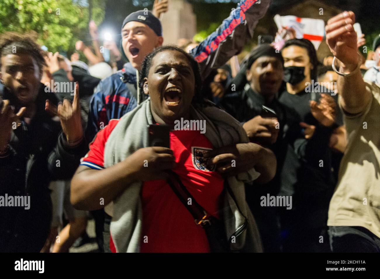 England supporters celebrate victory following the UEFA EURO 2020 semi ...
