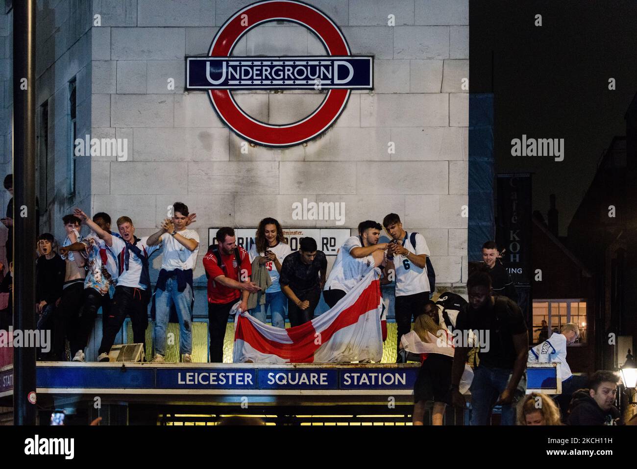 England supporters celebrate victory following the UEFA EURO 2020 semi ...