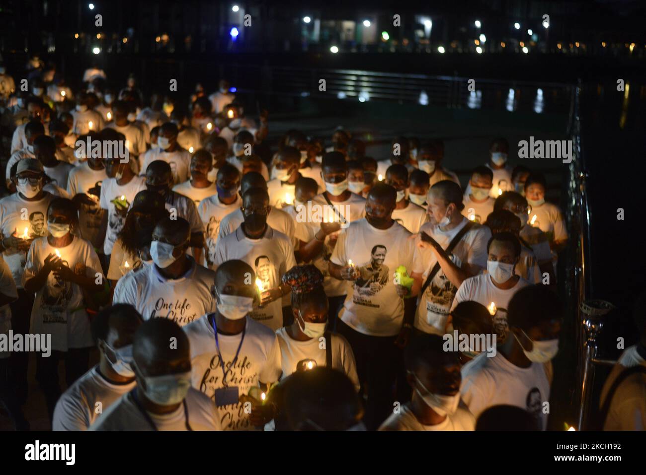 Members of Synagogue Church of All Nations (SCOAN) hold a candlelight ...