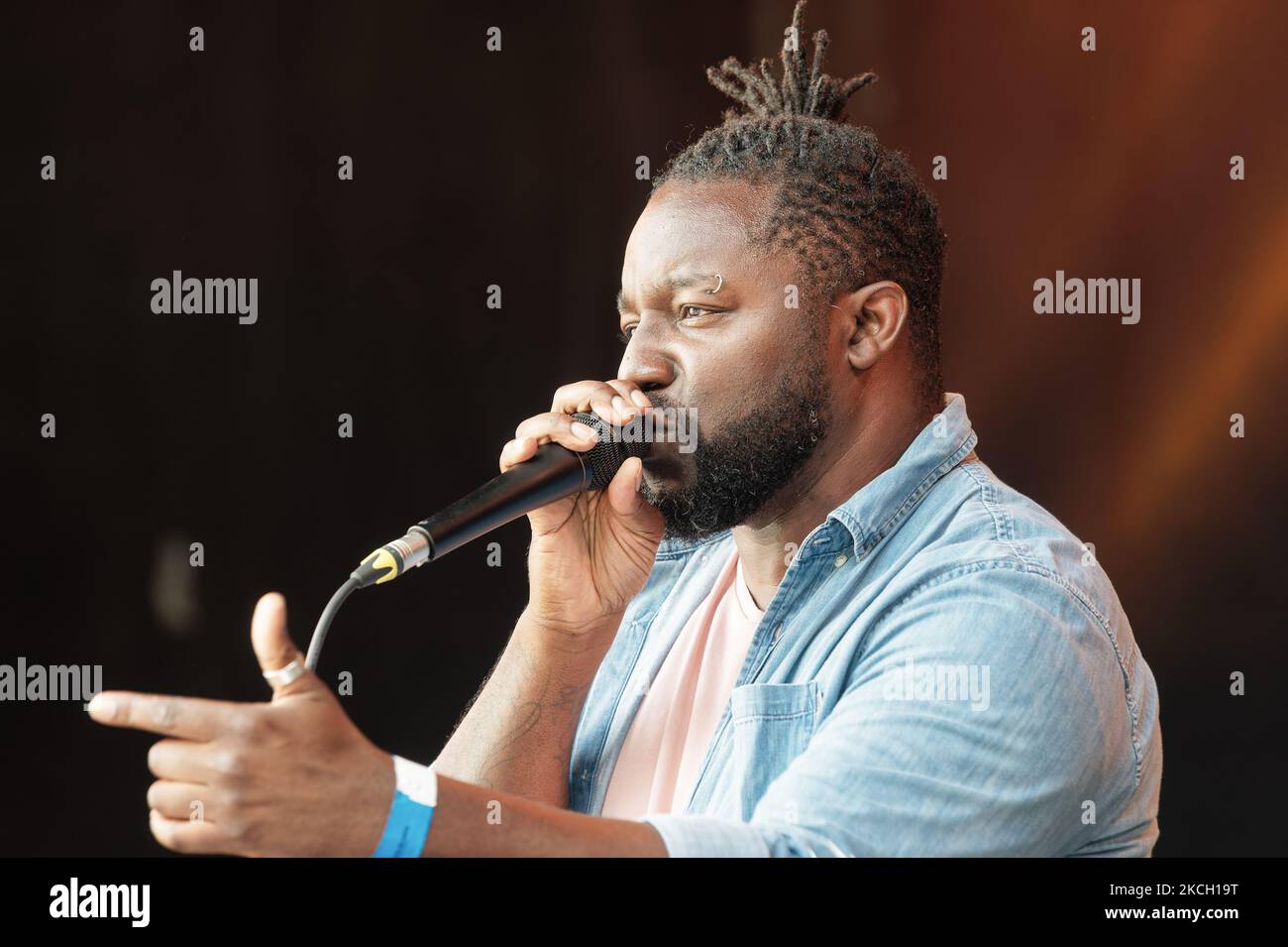 French singer Sly Johnson and young musicians perform on stage during ...