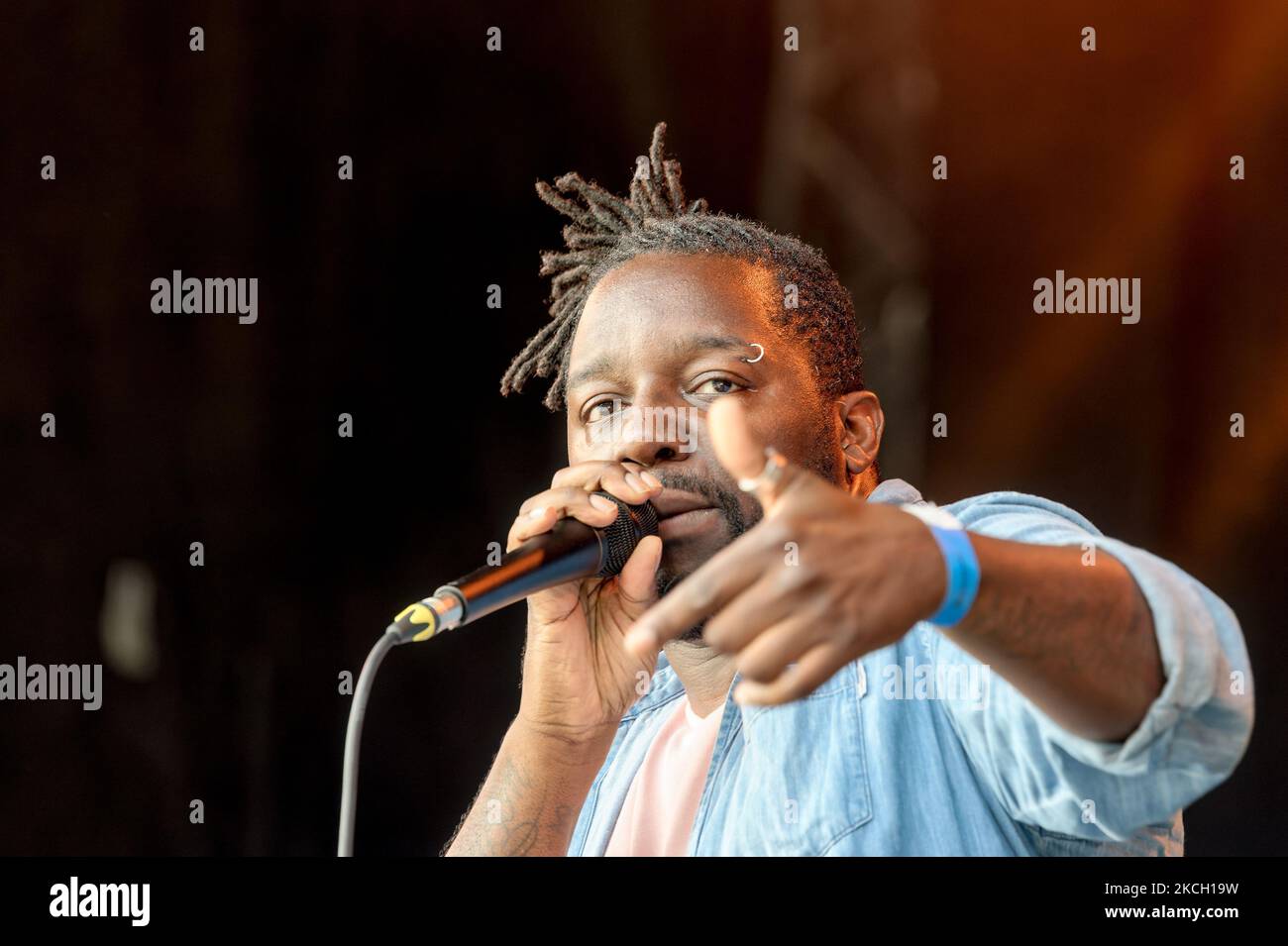French singer Sly Johnson and young musicians perform on stage during ...