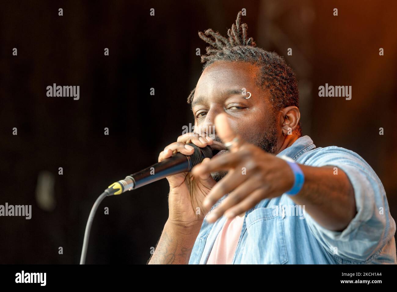 French singer Sly Johnson and young musicians perform on stage during ...