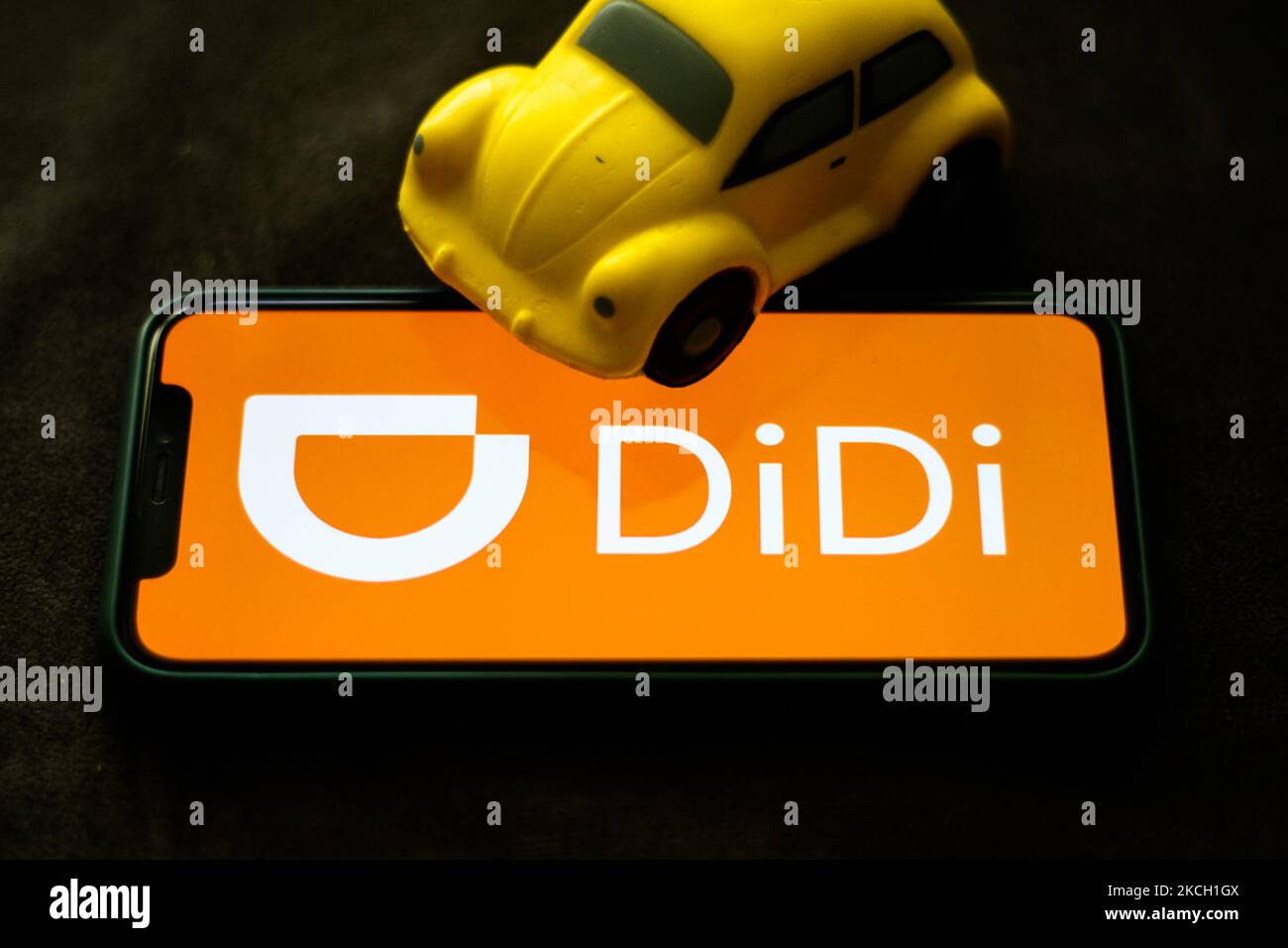 DiDi logo displayed on a phone screen is seen in this illustration ...