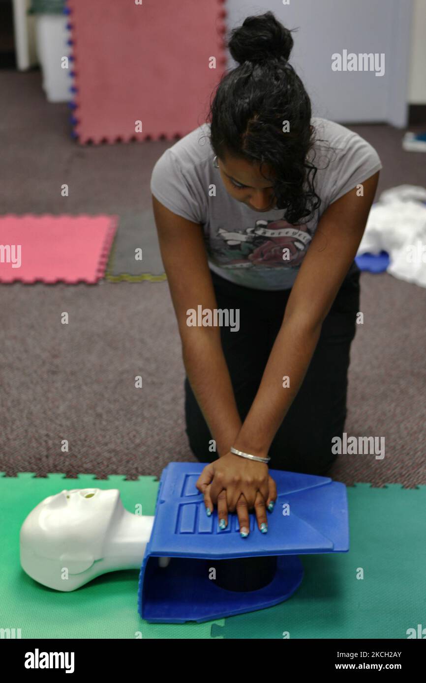 Chest compressions woman hi-res stock photography and images - Alamy