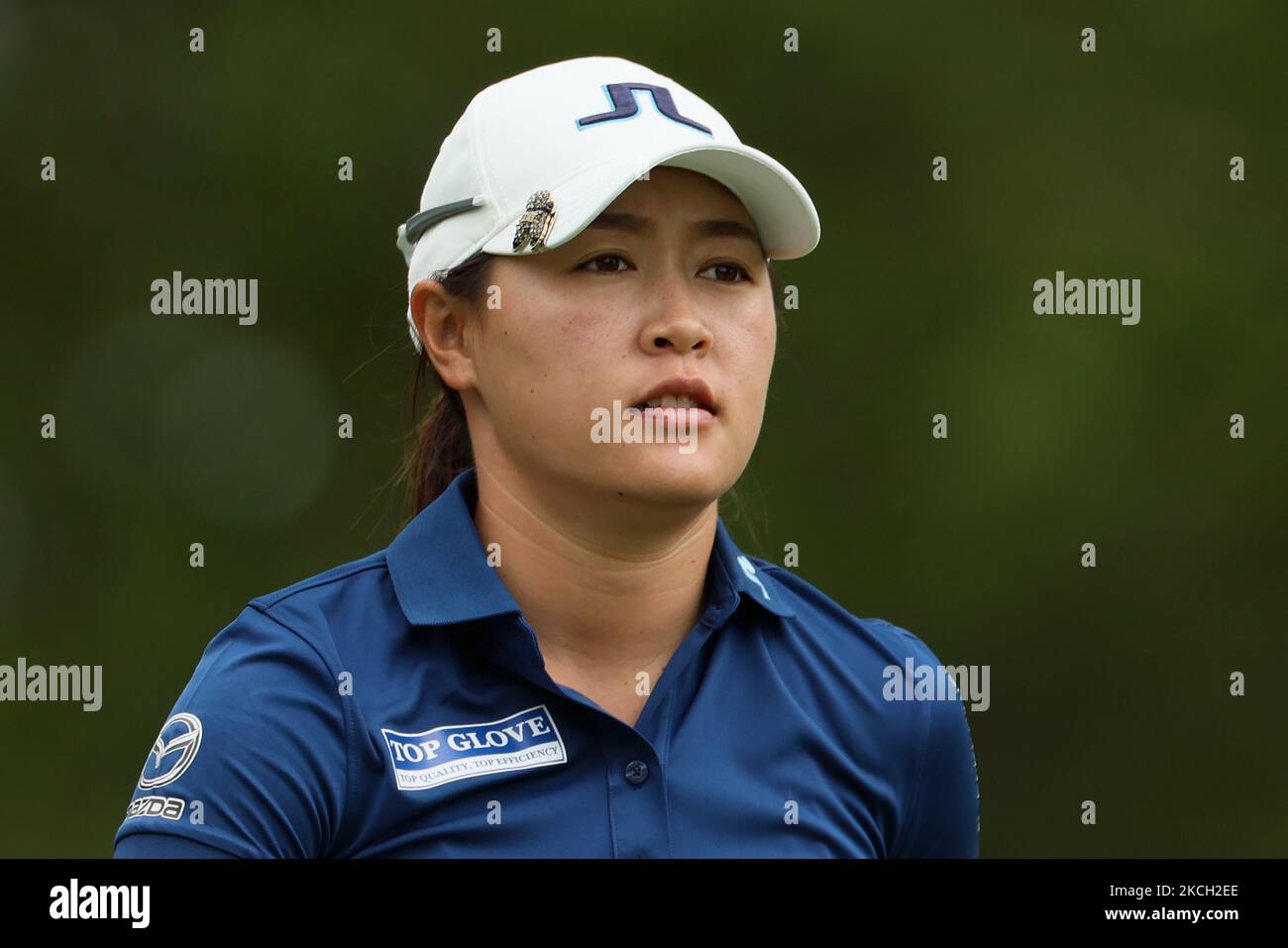 Kelly Tan of Batu Pahat, Malaysia follows her shot from the 3rd tee ...