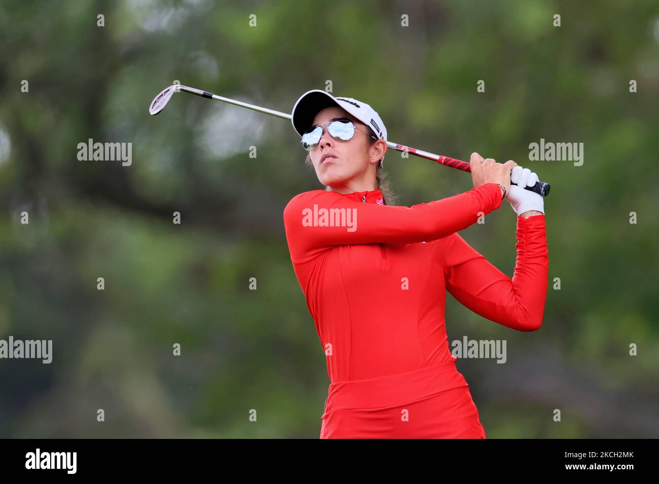 Maria Fassi of Pachuca, Mexico hits from the bunker to the 7th green ...