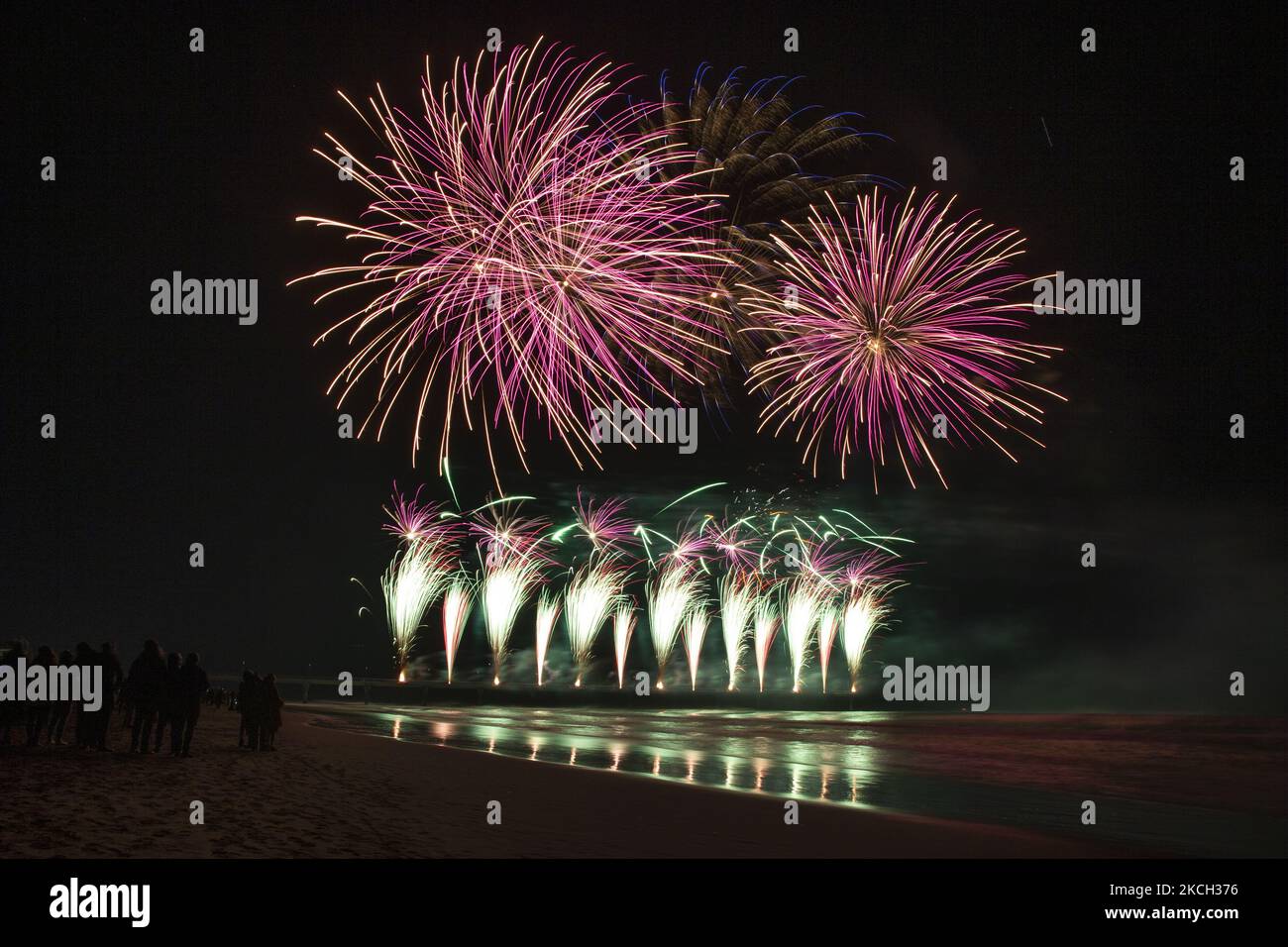 Fireworks illuminate the sky above the New Brighton Pier during ...