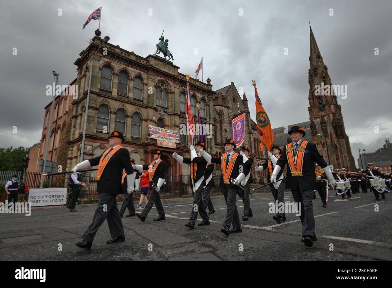 Members of the Orange Order and their supporters take part in the ...