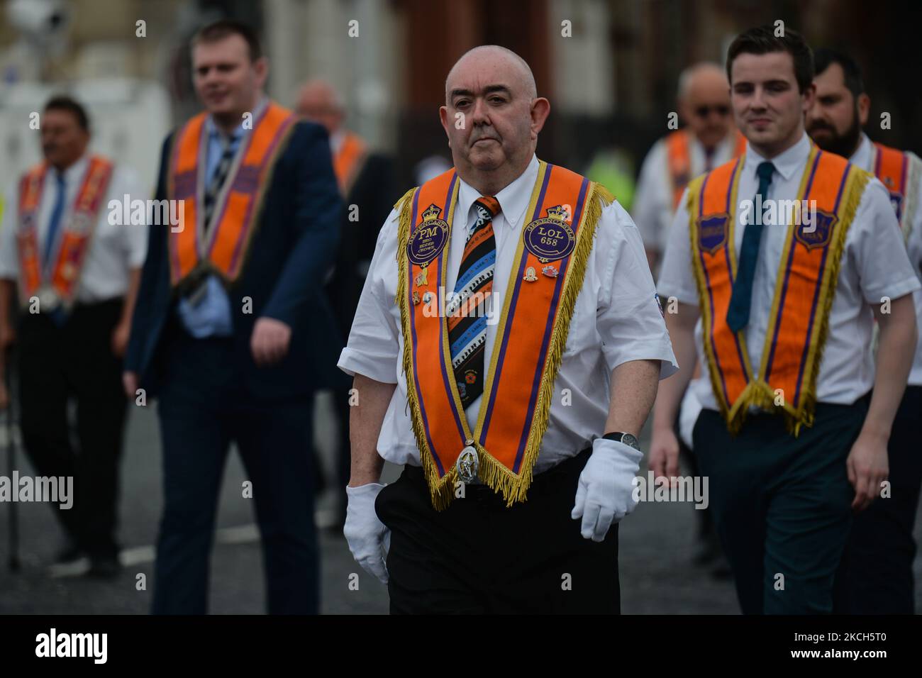 Members of the Orange Order and their supporters take part in the ...