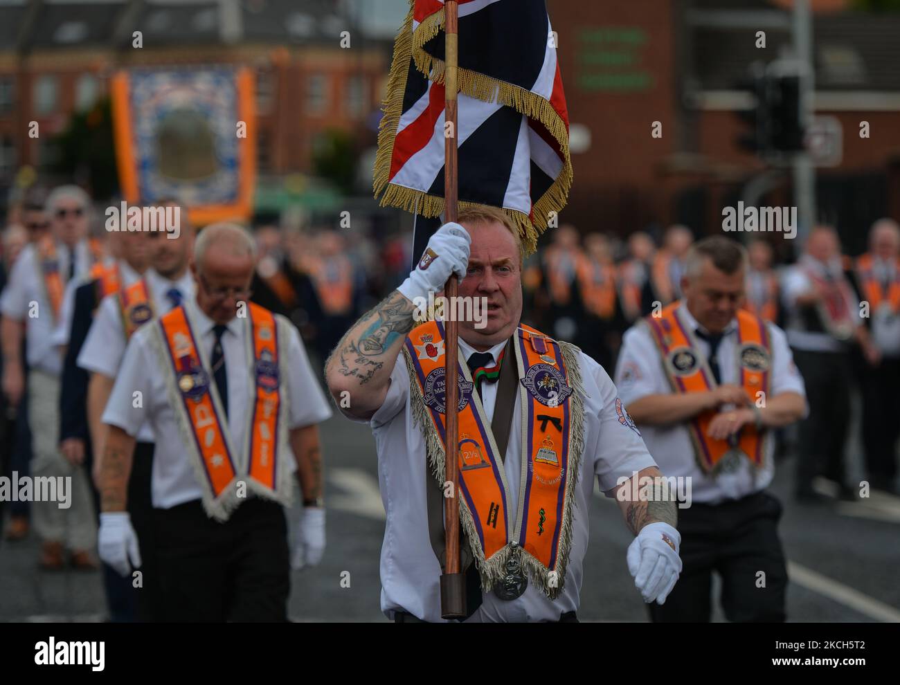 Members of the Orange Order and their supporters take part in the ...