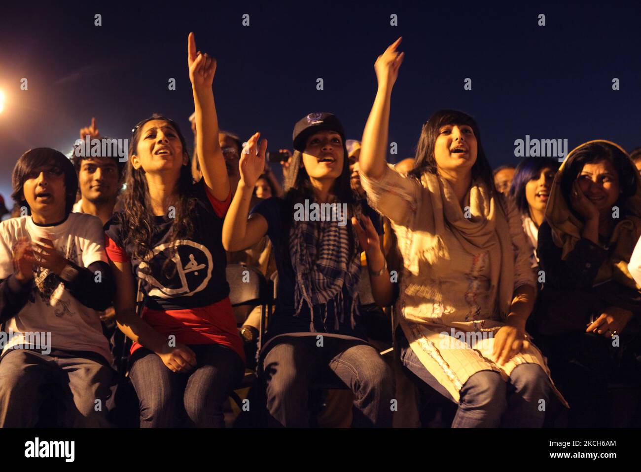 Young Pakistani fans scream in delight as the Pakistani rock band Jal ...