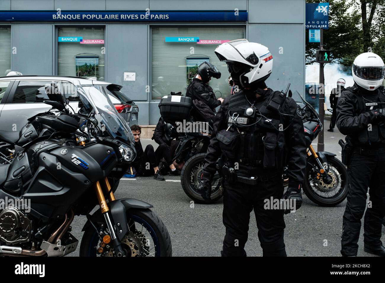 BRAV-M motorcycle riot police officers with fully hooded faces ...