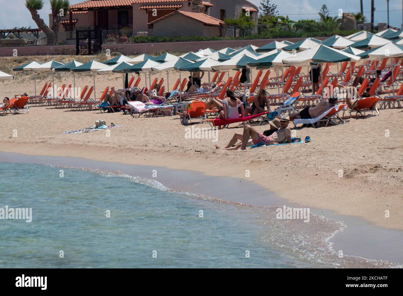 Beautiful greek woman in bikini hi-res stock photography and images - Alamy