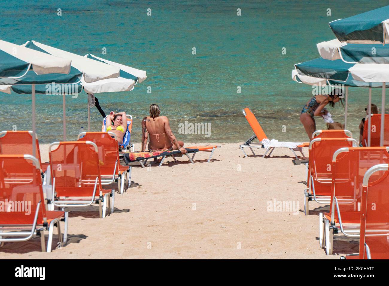 Beautiful greek woman in bikini hi-res stock photography and images - Alamy