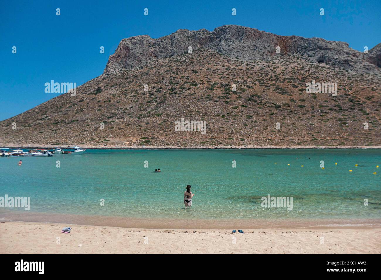 Beautiful greek woman in bikini hi-res stock photography and images - Alamy