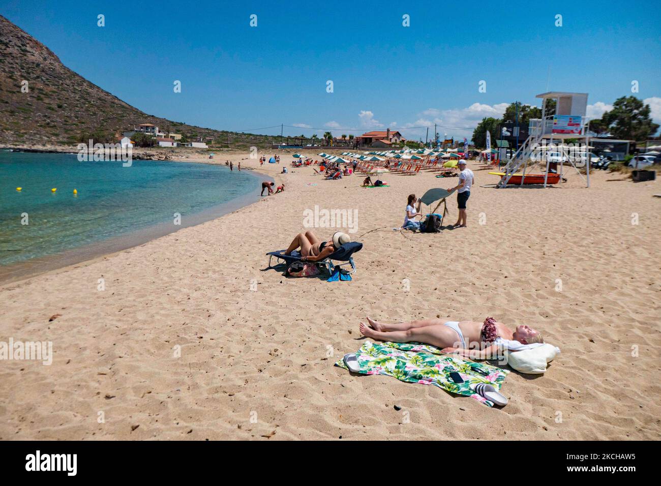 Beautiful greek woman in bikini hi-res stock photography and images - Alamy