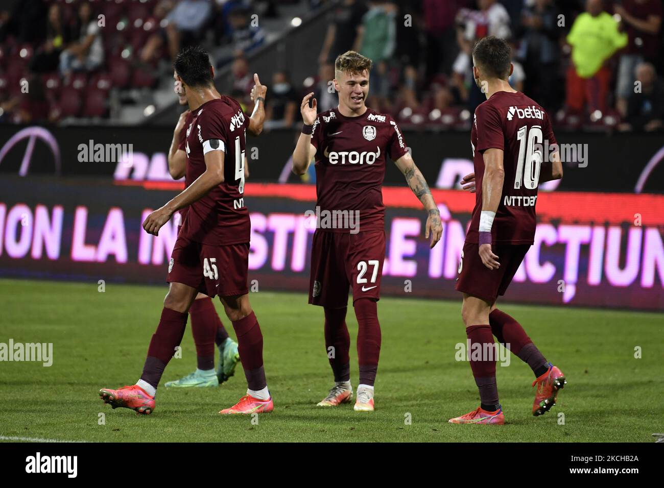 Players of CFR Cluj celebrating their winning goal agaist FC U Craiova ...