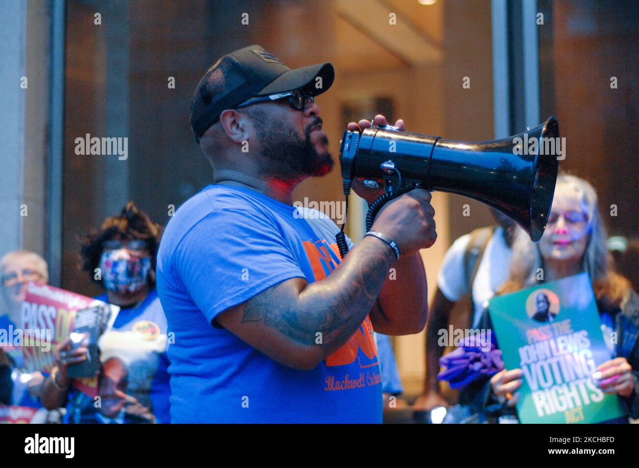 Tommy Blackwell sings the Black National Anthem during a candlelight ...