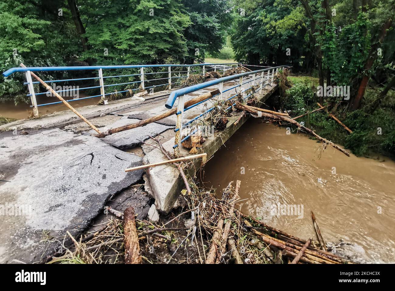 A bridge in Krzyszkowice near Krakow was damaged after being flooded ...