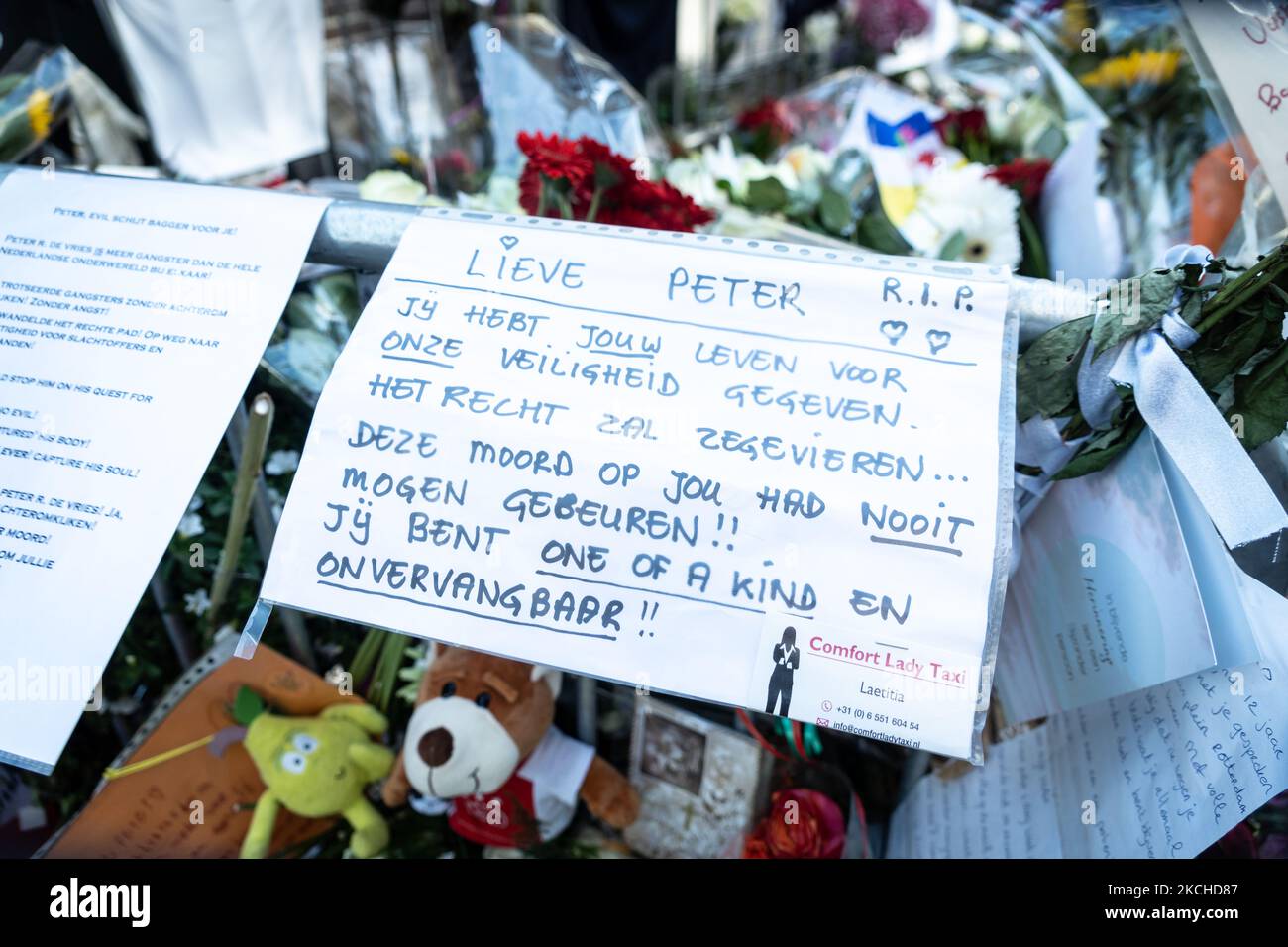 Flowers, candles and other attributes at the place where Peter R. de ...