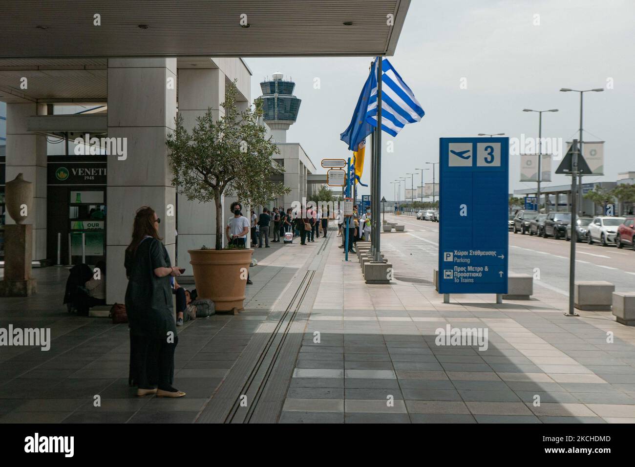 Exterior of the departure area and the control tower of Athens Airport ...